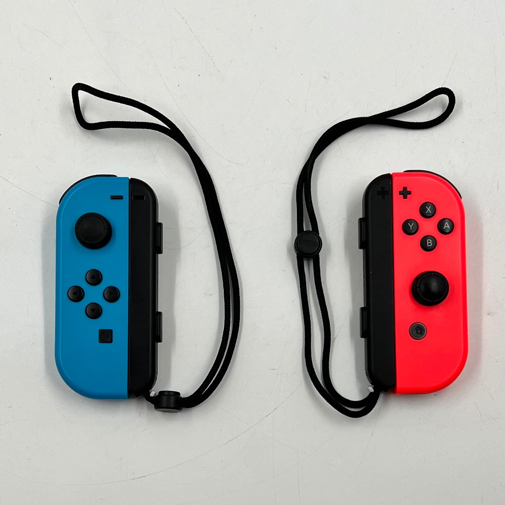 Pre-owned OFFICIAL NINTENDO SWITCH JOYCONS - NEON RED & BLUE - Own4Less